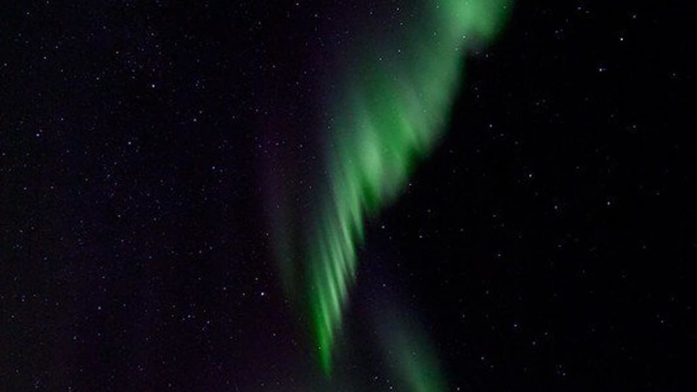 Unexpected Aurora Show: Pilot Goes Off Course for Sky Spectacle