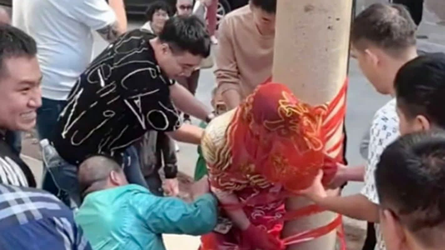 Chinese Tradition Under Fire After Bride is Taped to Utility Pole in ...